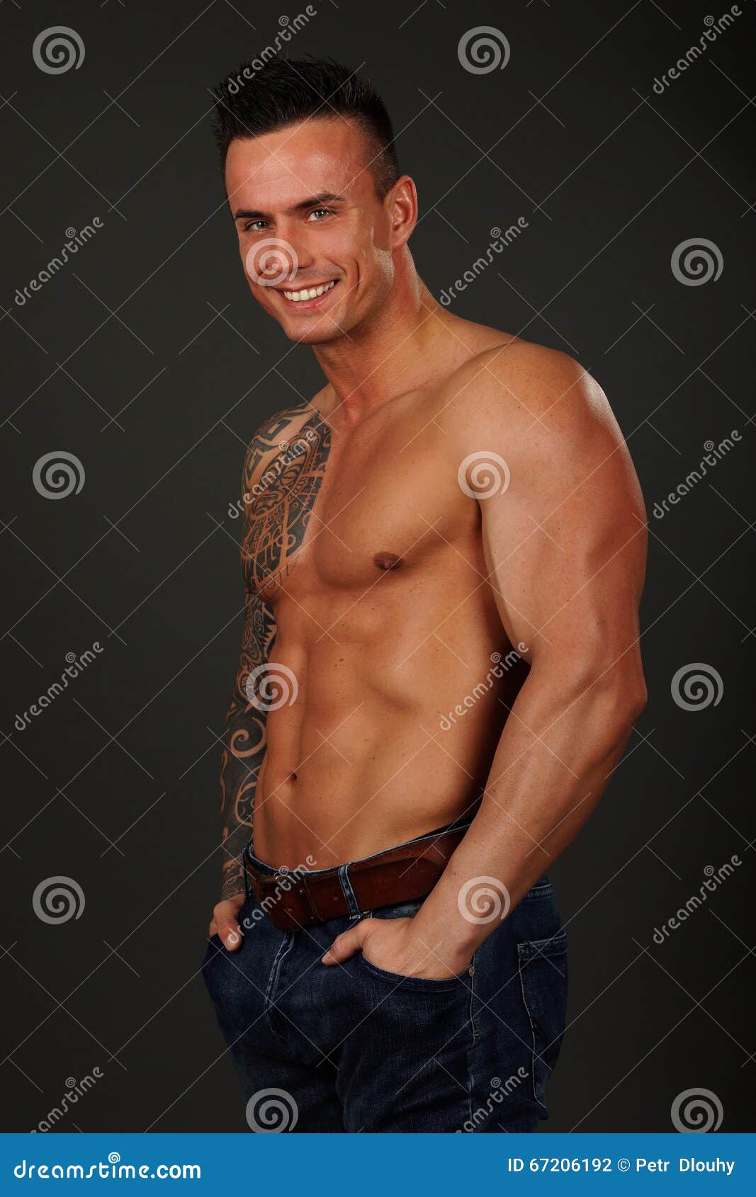 Muscular man poses stock photo. Image of adult, smile - 67206192