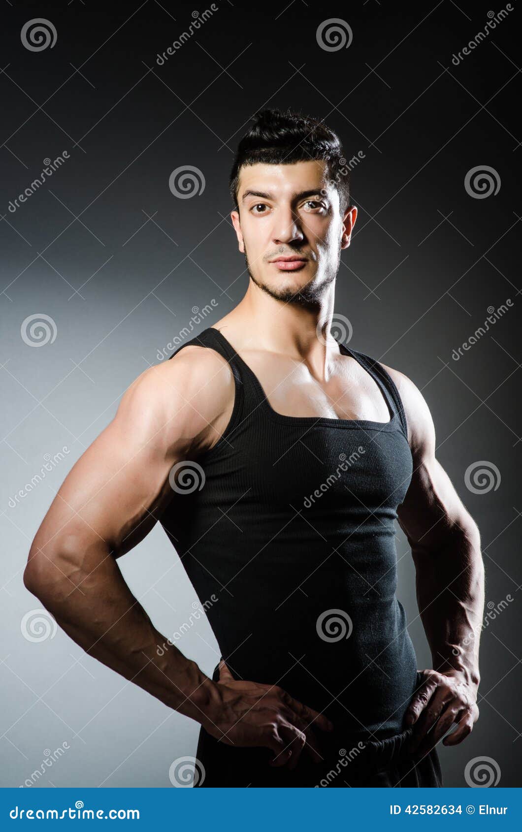 Muscular man posing stock photo. Image of male, biceps - 42582634