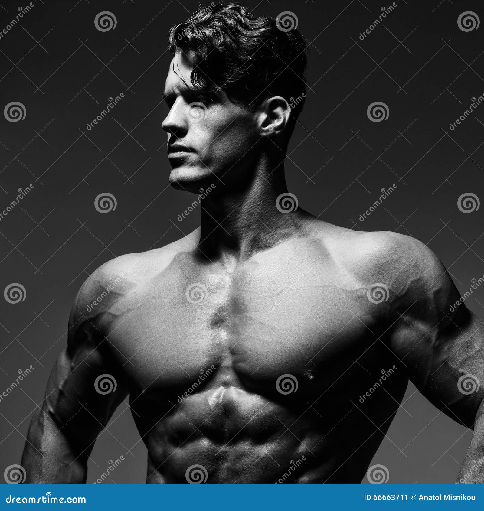 Muscular man posing. stock image. Image of bodybuilder - 66663711