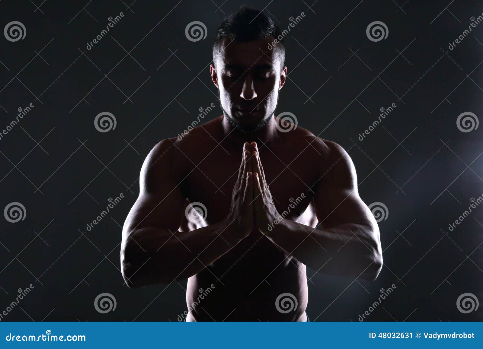 Muscular man praying stock image. Image of nude, dark - 48032631