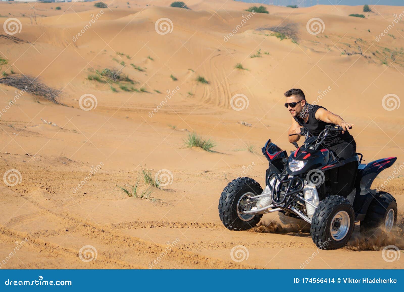Muscular Man Riding Atv in the Desert Stock Photo - Image of dangerous ...