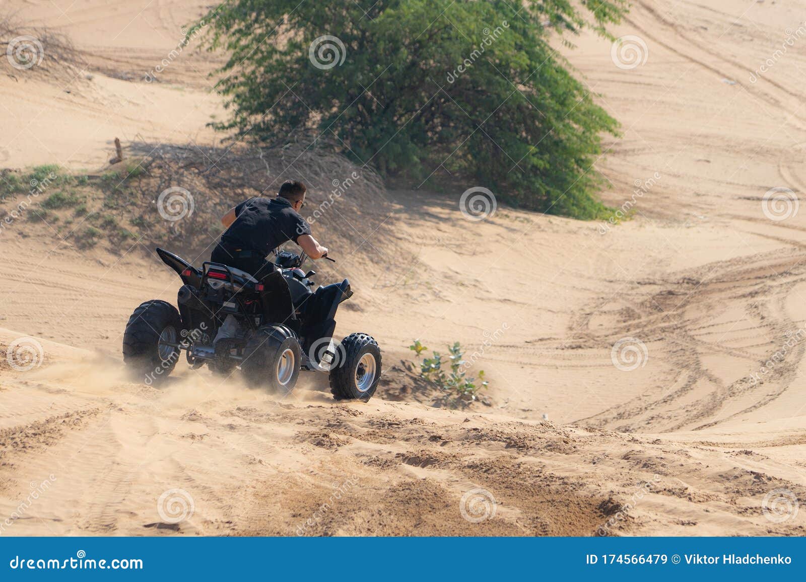 Muscular Man Riding Atv in the Desert Stock Image - Image of person ...