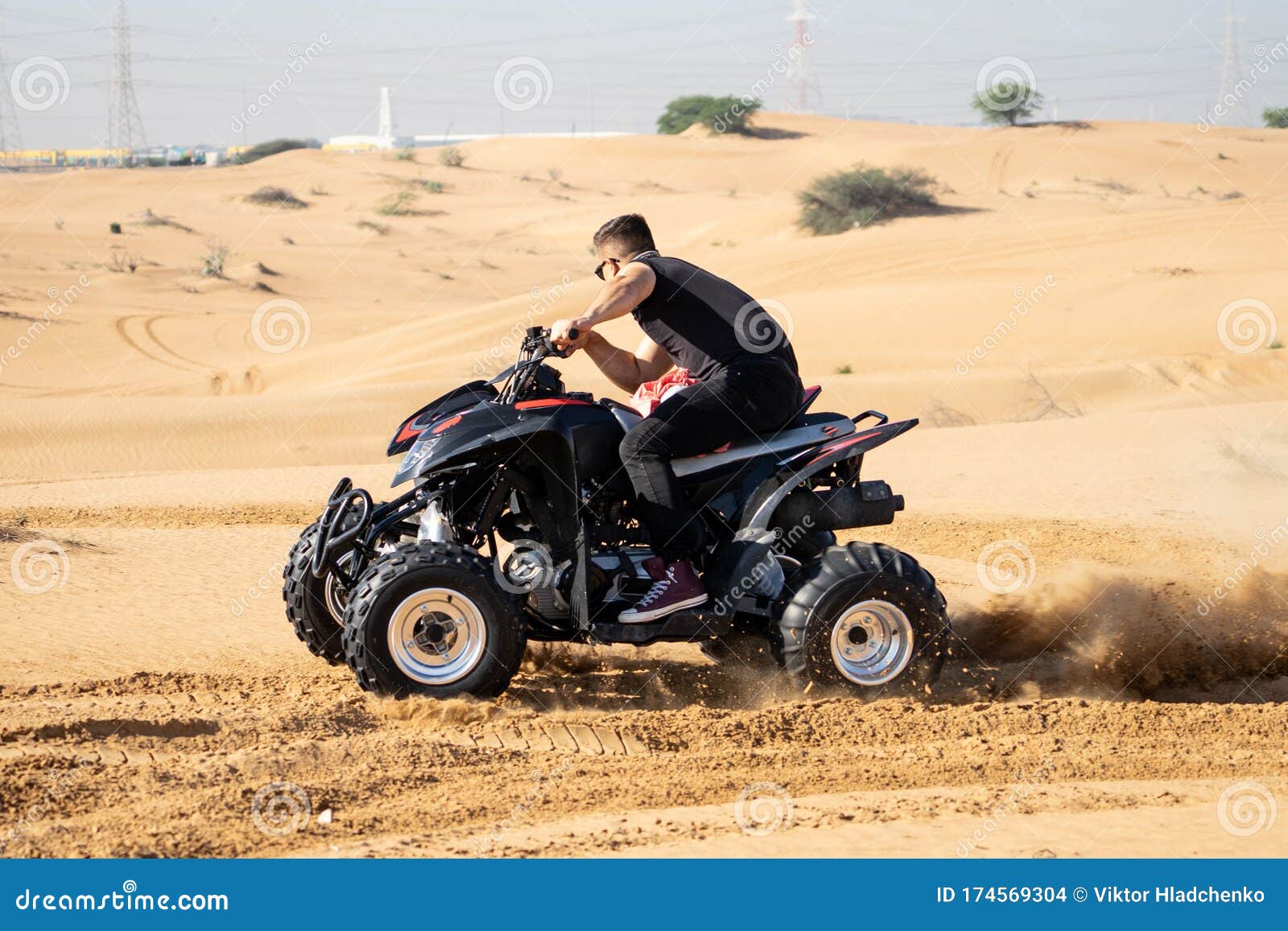 Muscular Man Riding Atv in the Desert Stock Photo - Image of desert ...