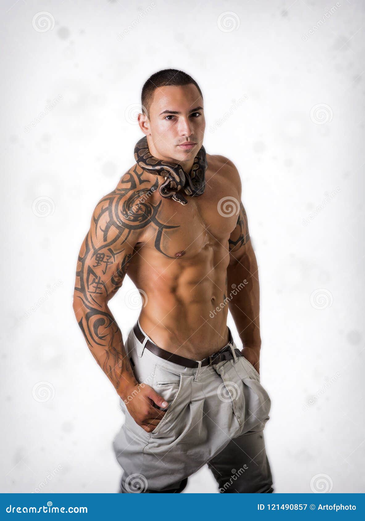 Muscular Man in Camo Pants with Snake Around Neck Stock Image - Image ...