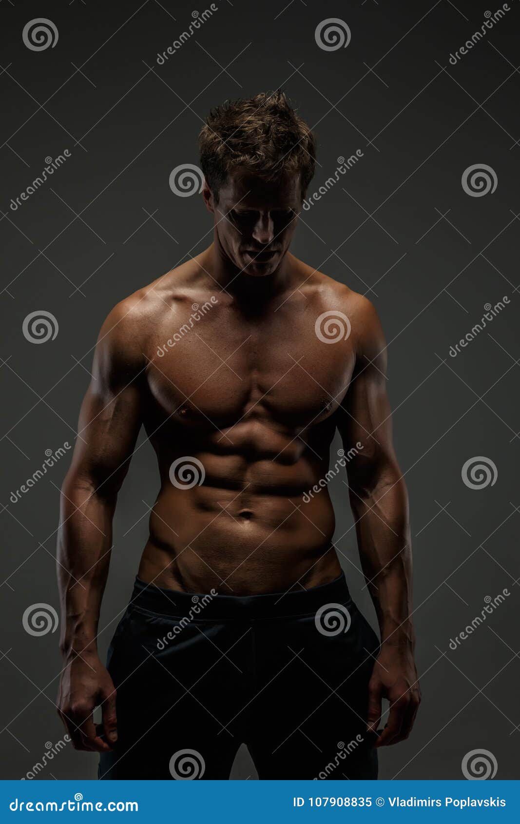 Muscular man in shorts stock image. Image of macho, color - 107908835