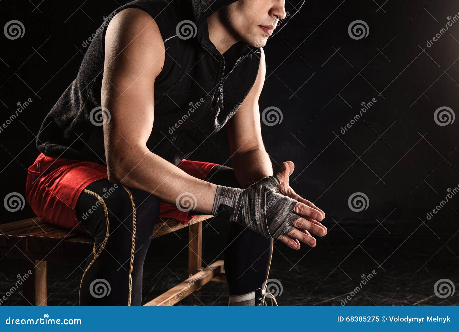 The Muscular Man Sitting and Resting on Black Stock Image - Image of ...