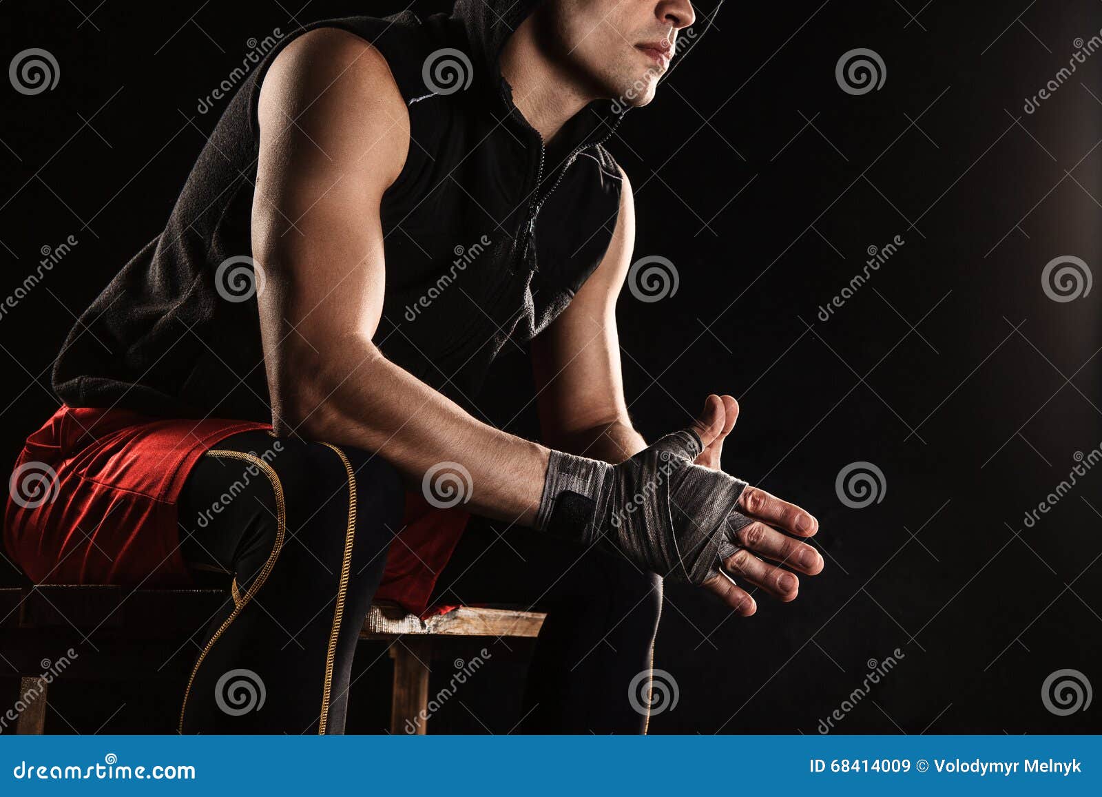 The Muscular Man Sitting and Resting on Black Stock Image - Image of ...