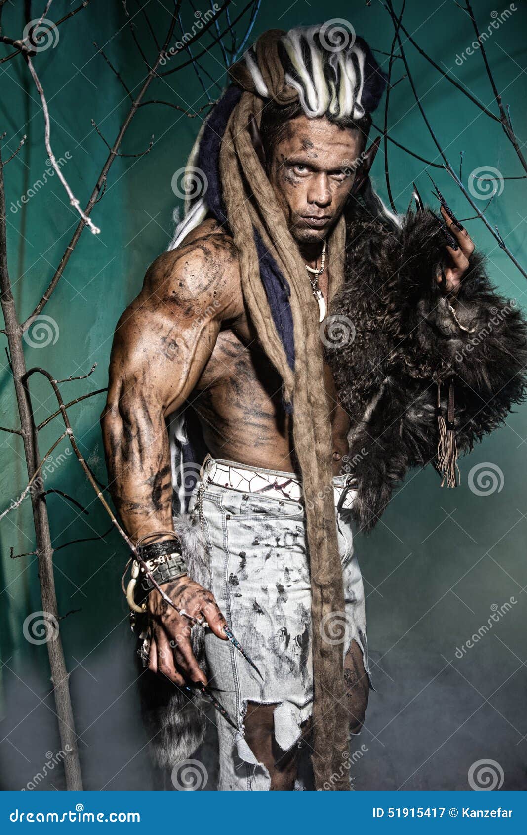 Muscular Man with Skin and Dreadlocks among the Trees Stock Image ...