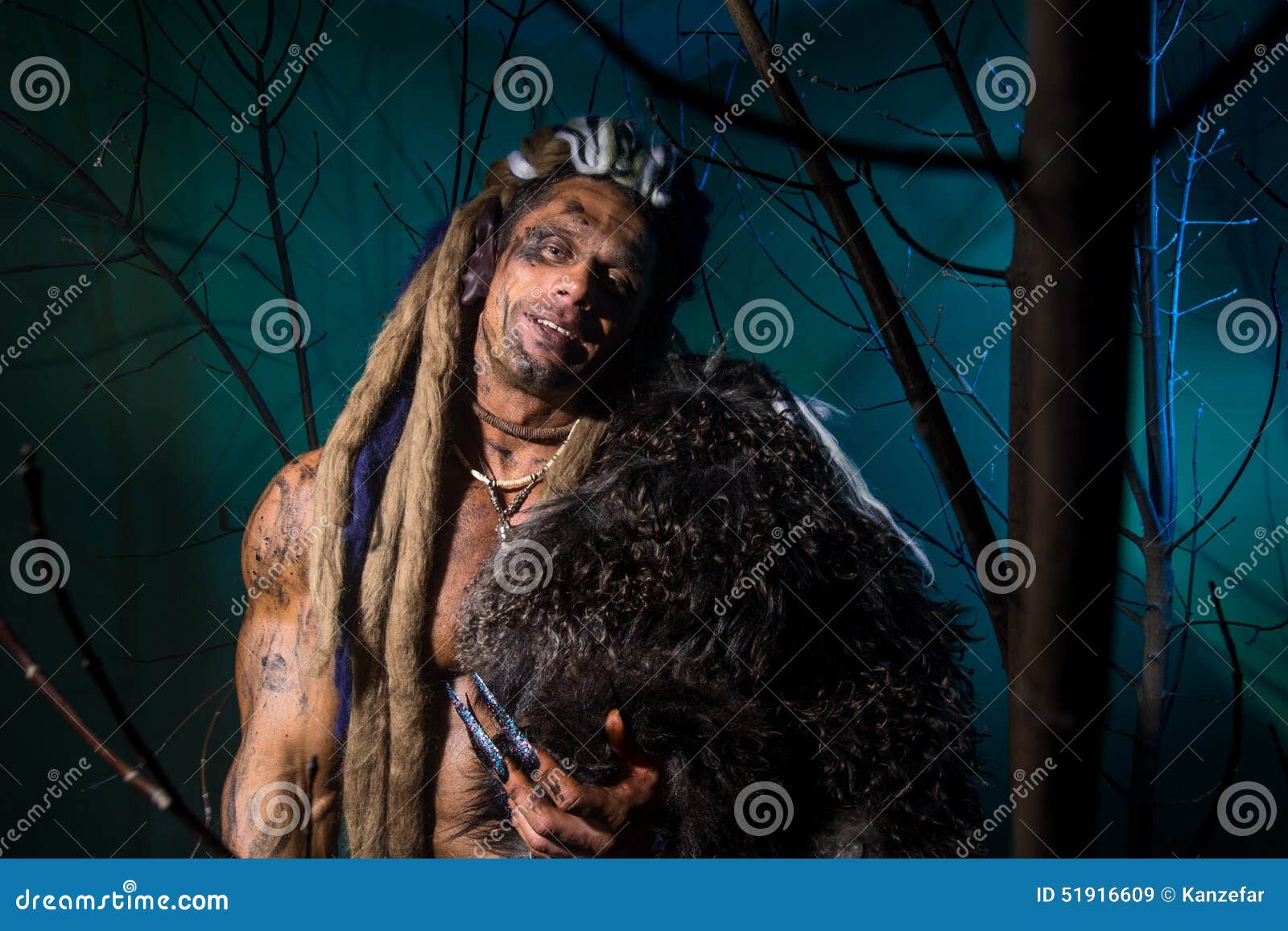 Muscular Man with Skin and Dreadlocks among the Trees Stock Image ...