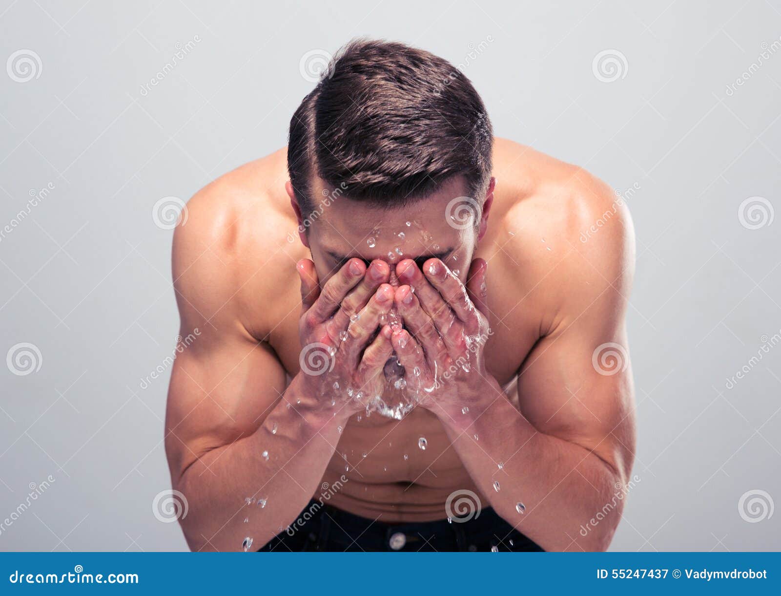 Muscular Man Spraying Water on His Face Stock Image - Image of male ...