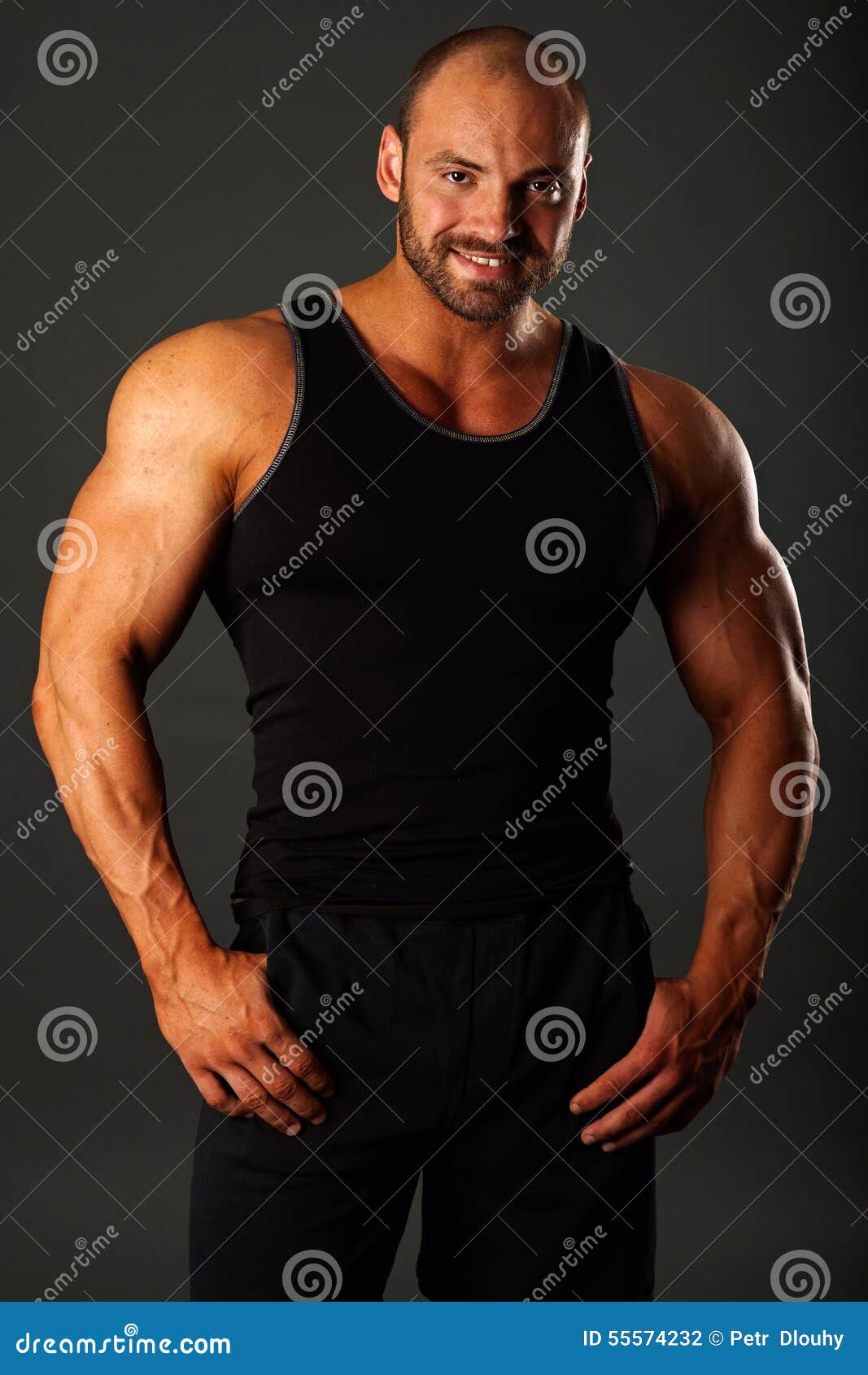 Muscular man standing stock photo. Image of male, exercise - 55574232