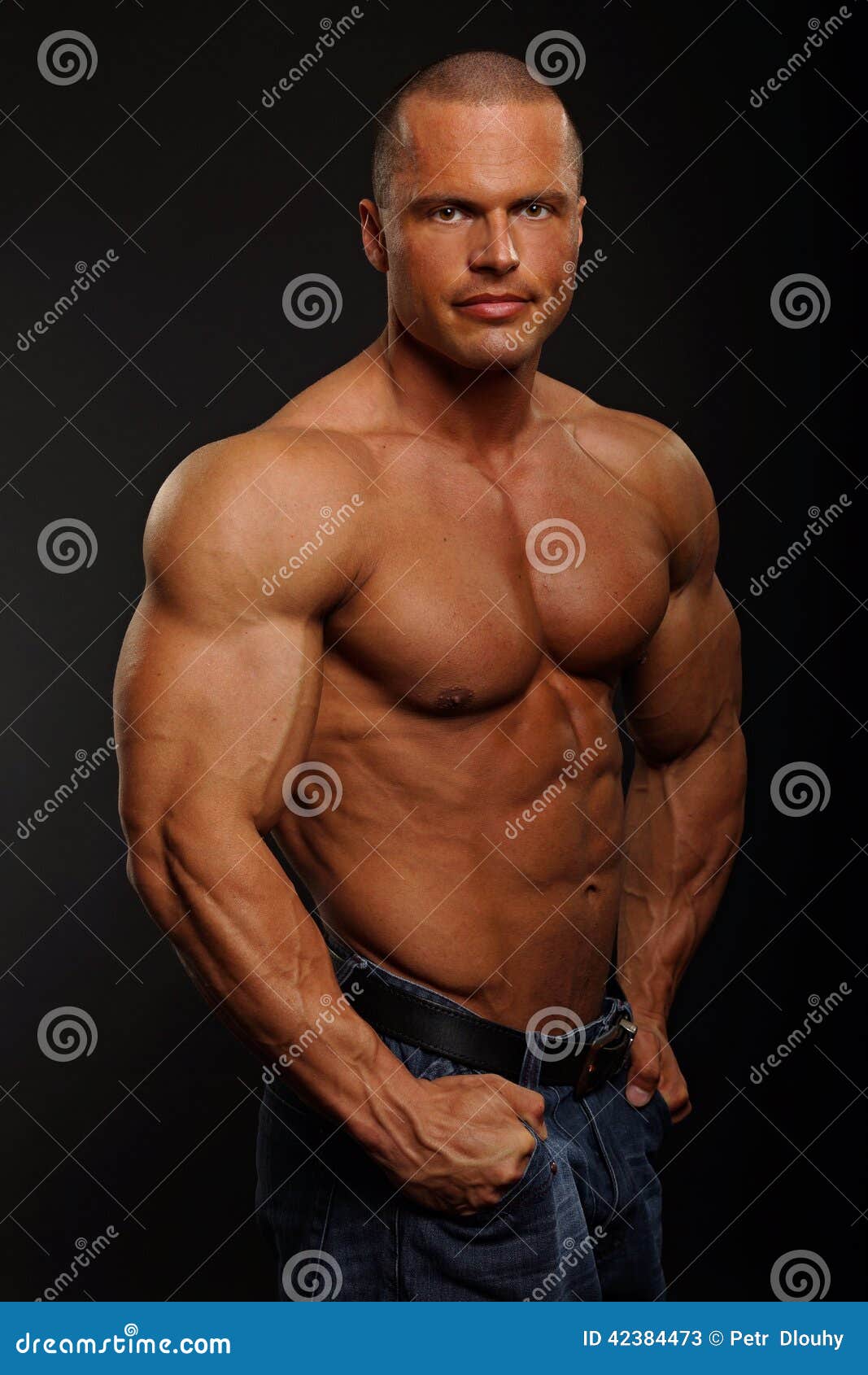 Muscular man standing stock image. Image of abdomen, muscles - 42384473