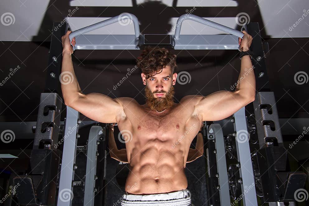 Muscular Man Training in the Gym Stock Photo - Image of male ...