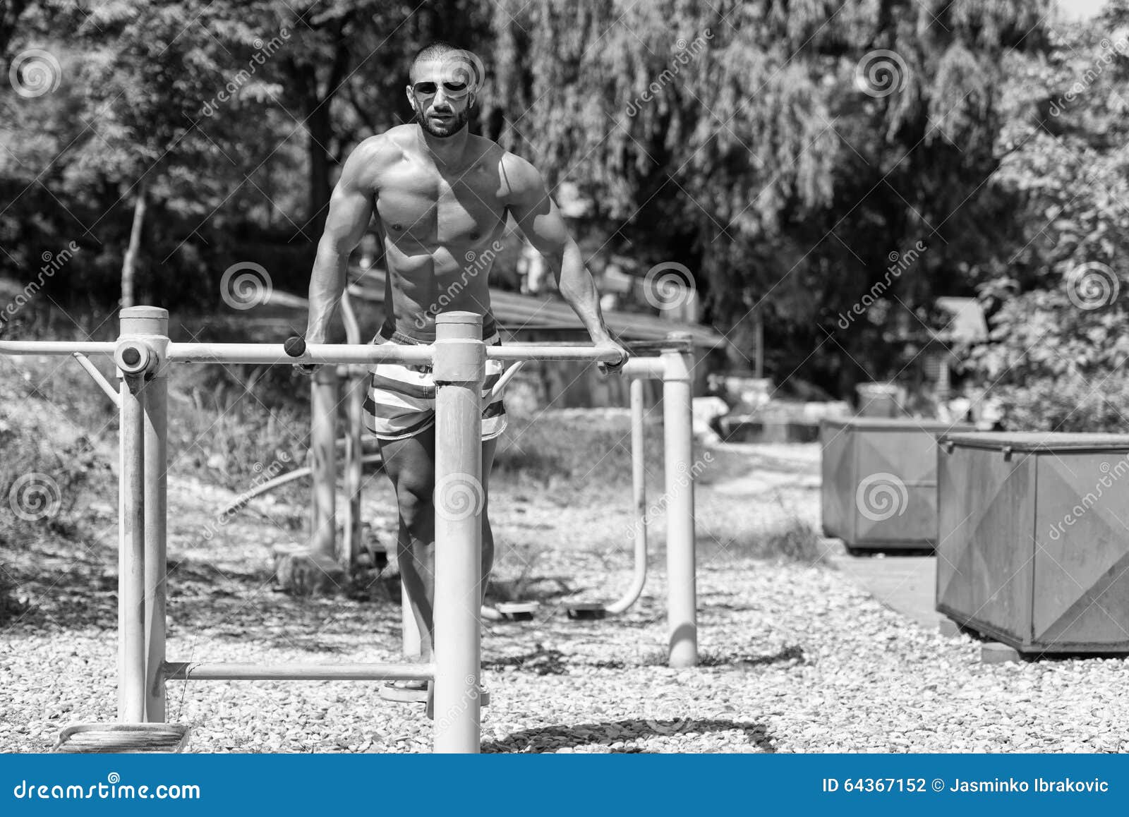 Muscular Man Training on the Playground in Park Stock Photo - Image of ...