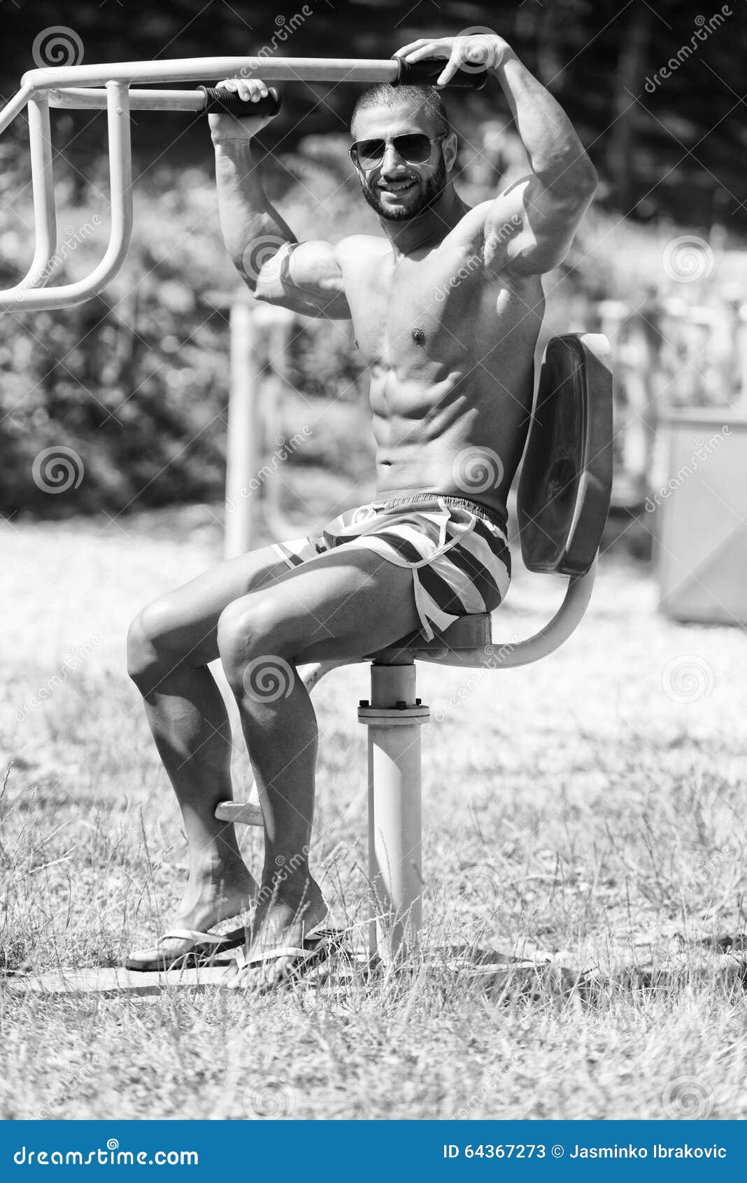 Muscular Man Training on the Playground in Park Stock Image - Image of ...