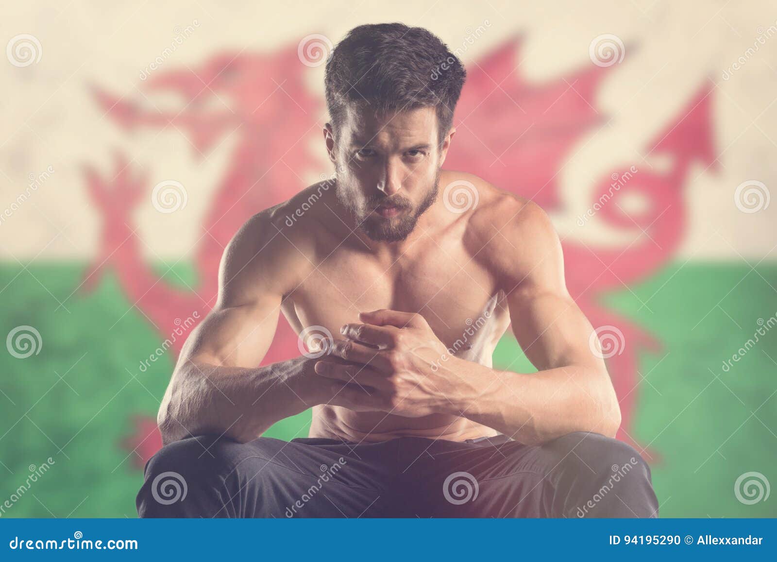 Muscular Man with Welsh Flag Behind Stock Photo - Image of national ...