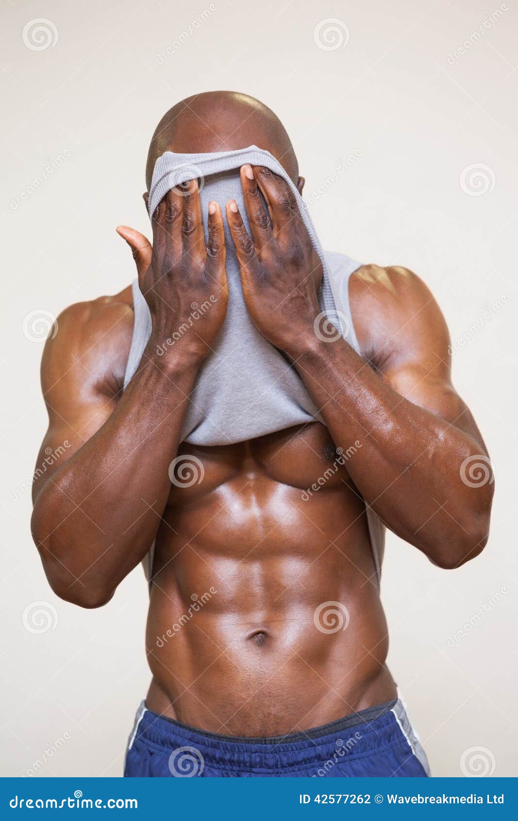 Muscular Man Wiping Sweat after Workout Stock Photo - Image of shot ...
