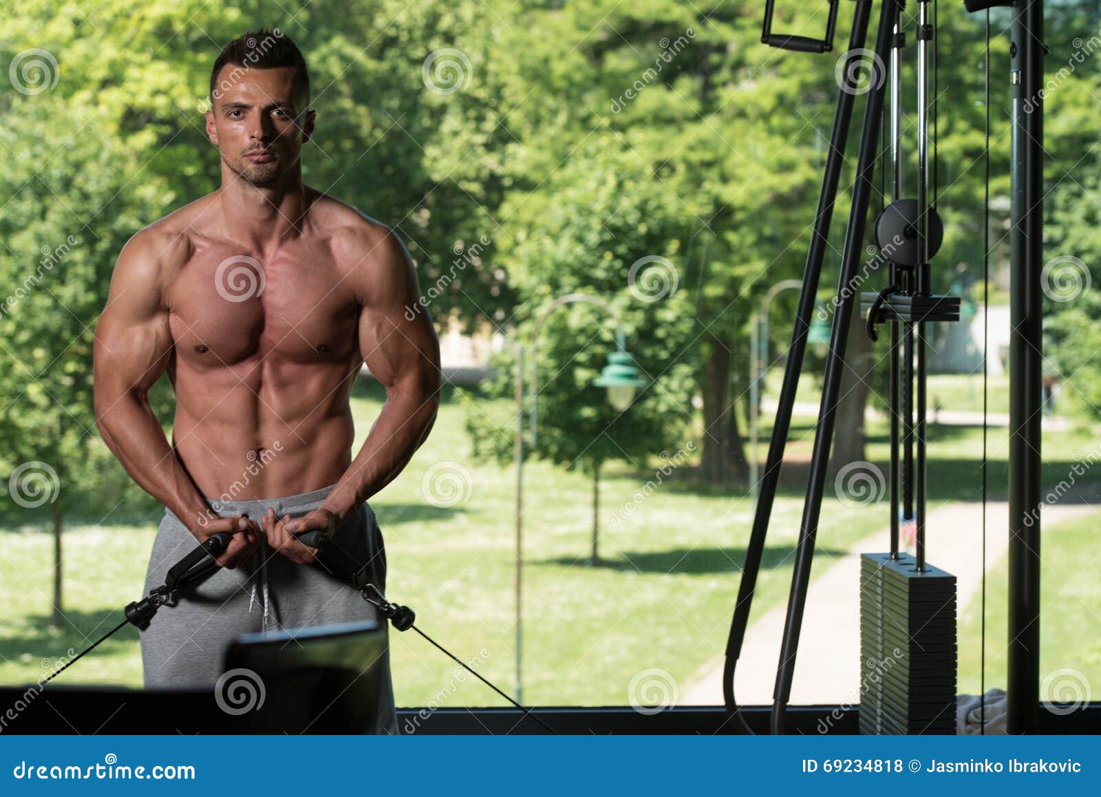 Muscular Man Working Out Chest on Cable Machine Stock Photo - Image of ...