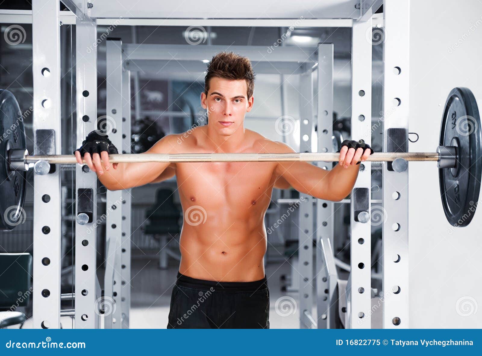 Muscular Man Working with a Rod Stock Image - Image of indoors ...