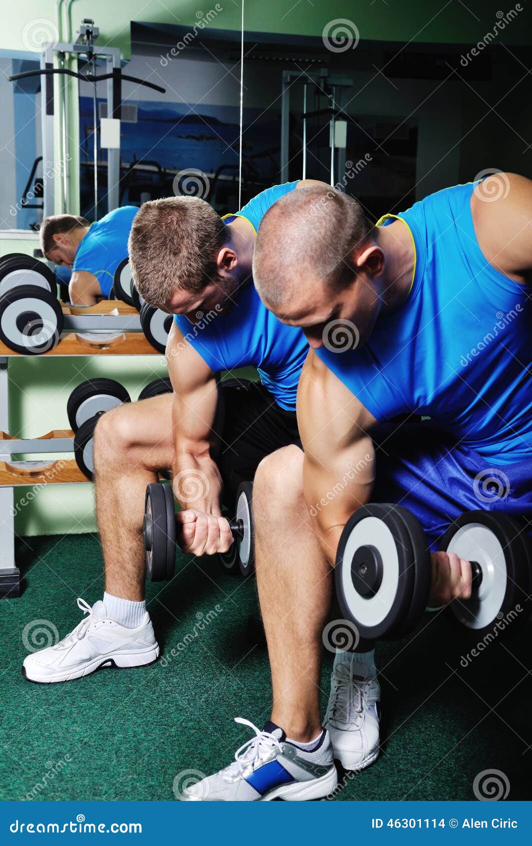 Muscular Men Exercising in a Gym Stock Photo - Image of strength ...