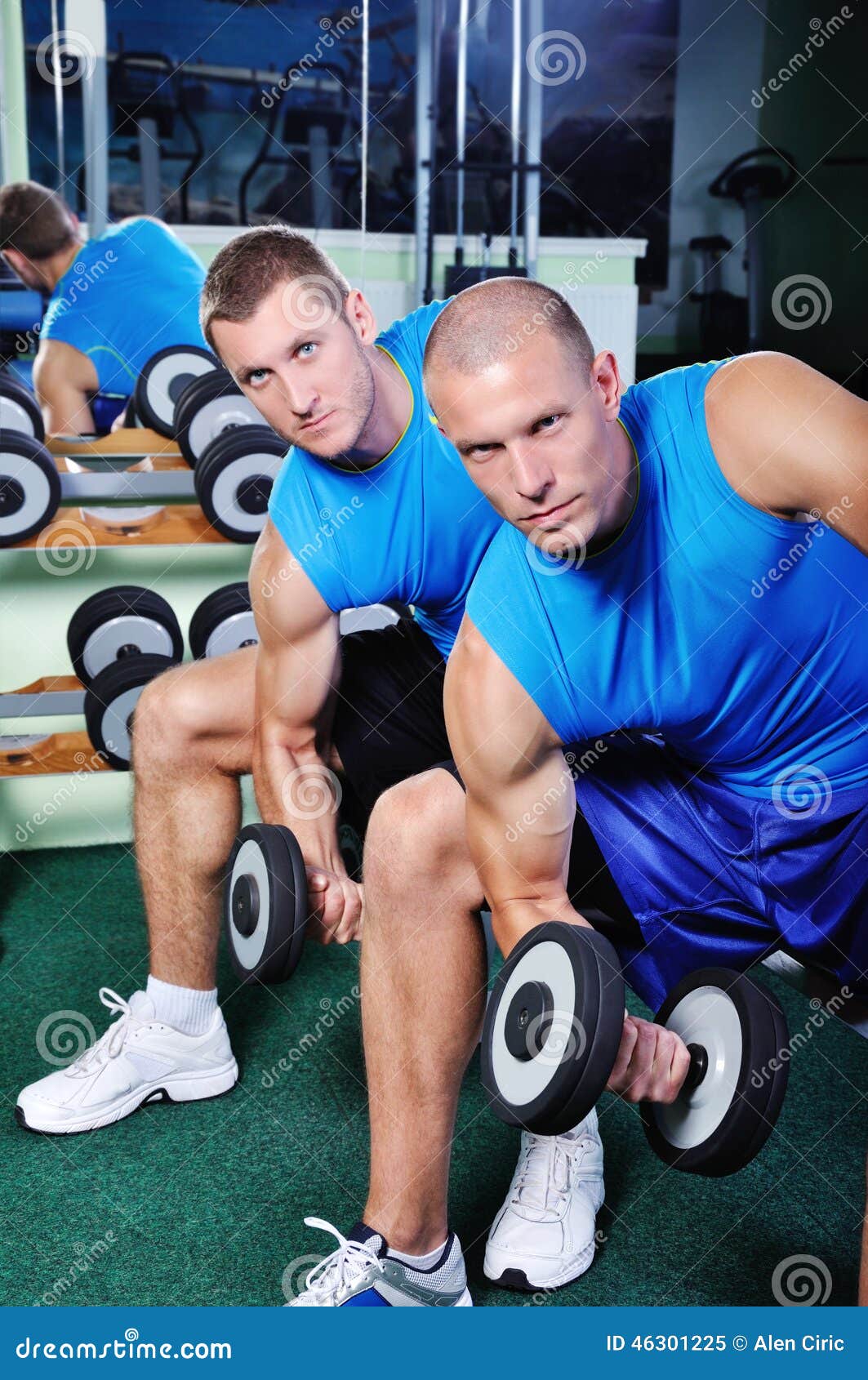 Muscular Men Exercising in a Gym Stock Image - Image of lifting, indoor ...