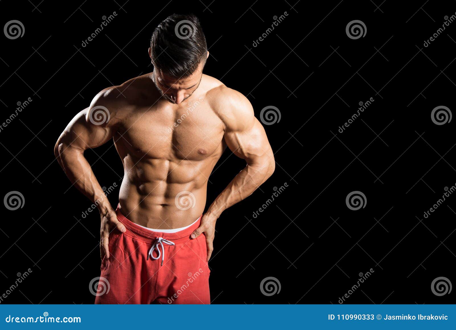 Muscular Men Flexing Muscles on Black Background Stock Image - Image of ...