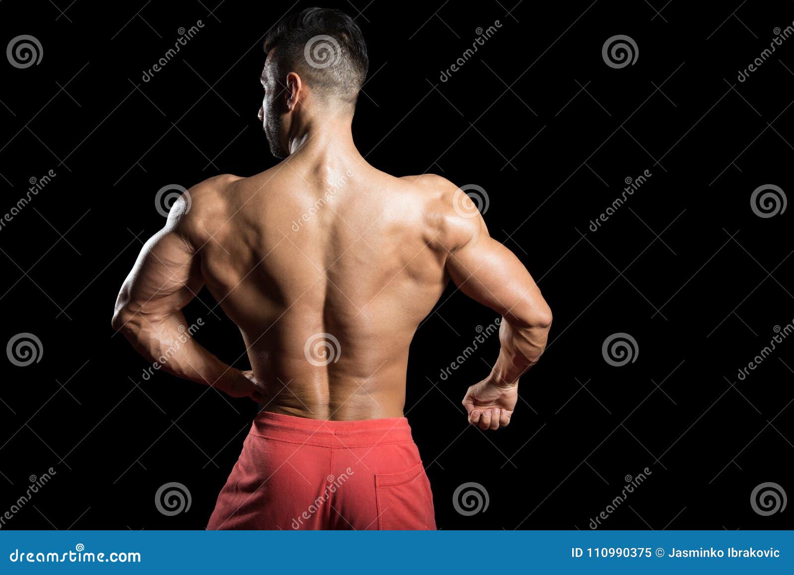 Muscular Men Flexing Muscles on Black Background Stock Image - Image of ...