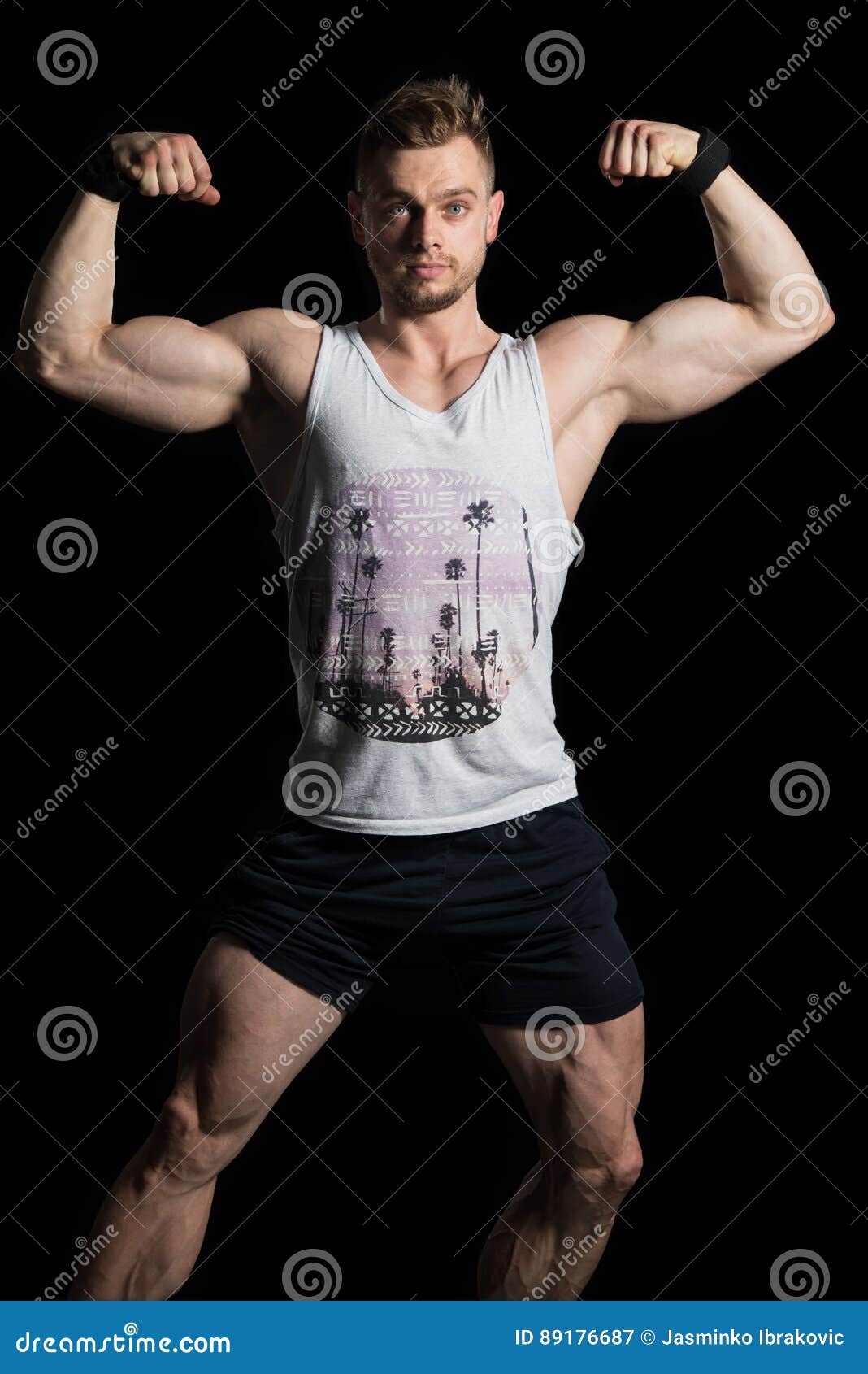 Muscular Men Flexing Muscles on Black Background Stock Image - Image of ...