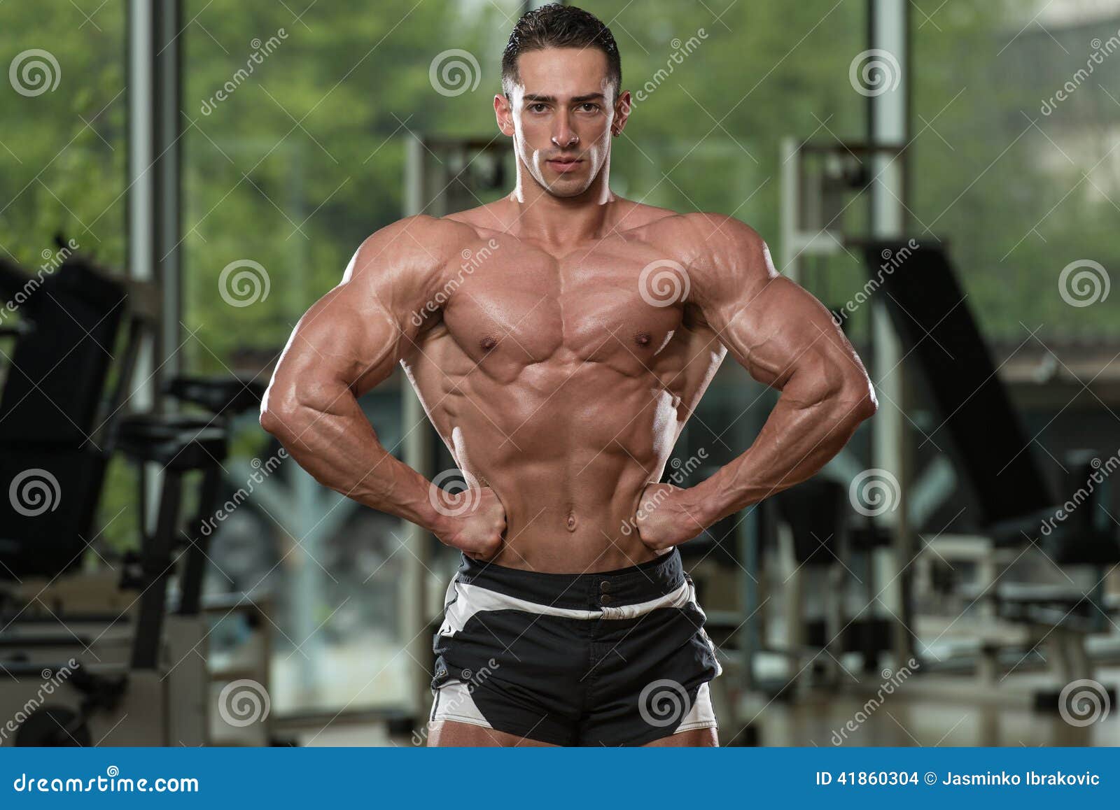 Muscular Men Flexing Muscles Stock Photo - Image of biceps, aerobics ...