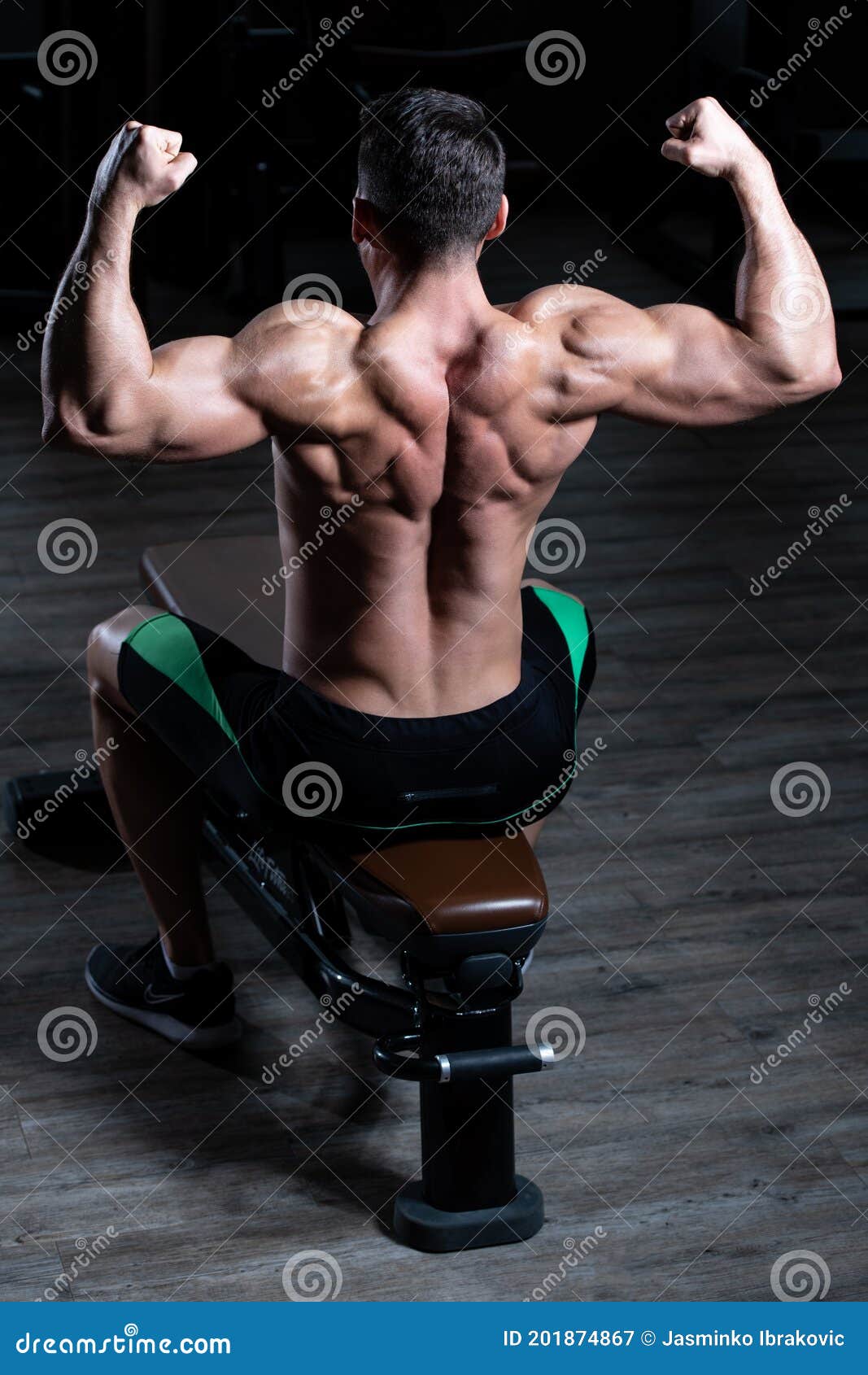Muscular Men Is Hitting Back Double Bicep Pose Stock Image Image Of Bicep Lift 201874867