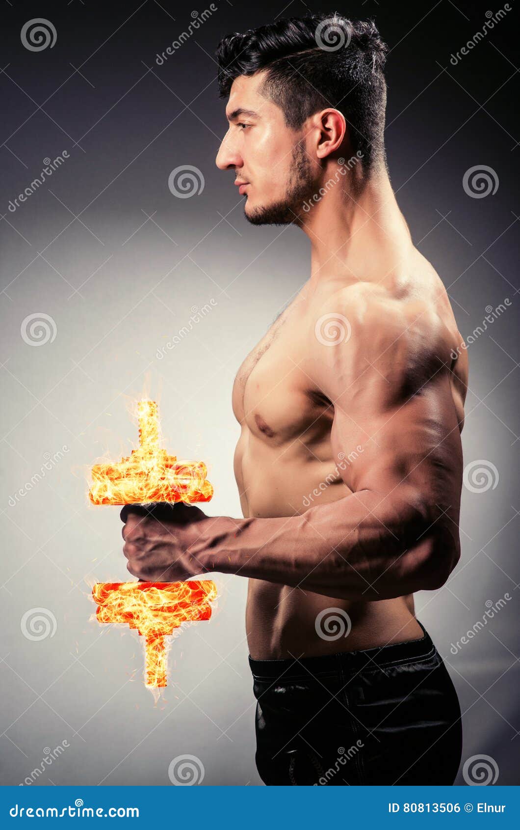 The Muscular Ripped Bodybuilder with Burning Dumbbells Stock Photo ...