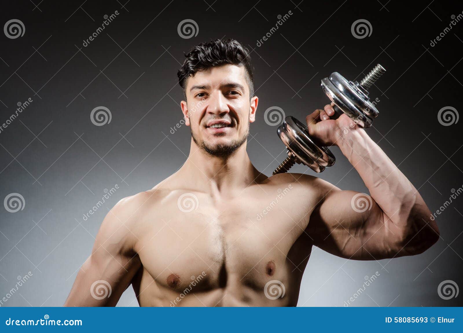 Muscular Ripped Bodybuilder with Dumbbells Stock Image - Image of ...