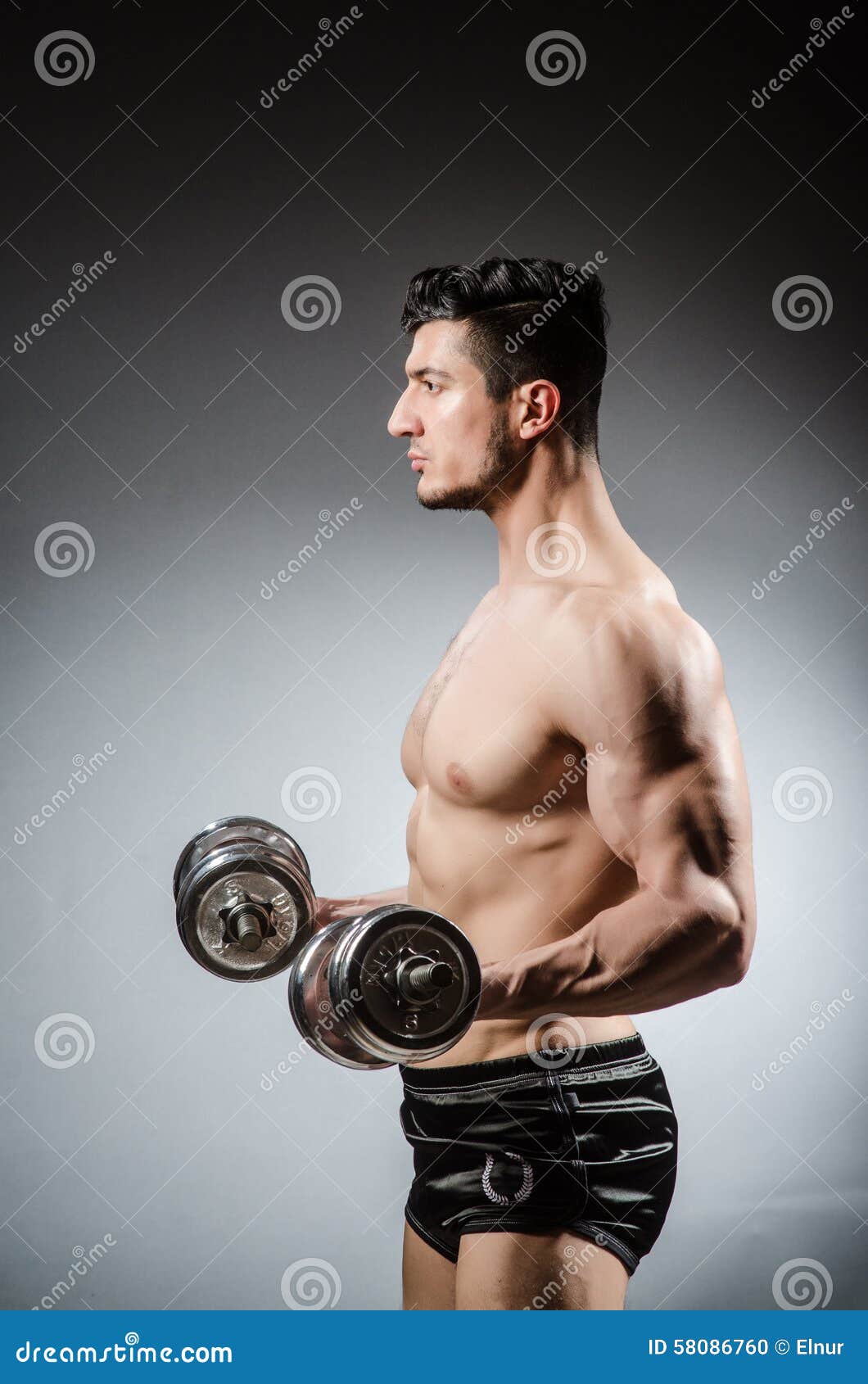 Muscular Ripped Bodybuilder with Dumbbells Stock Photo - Image of ...