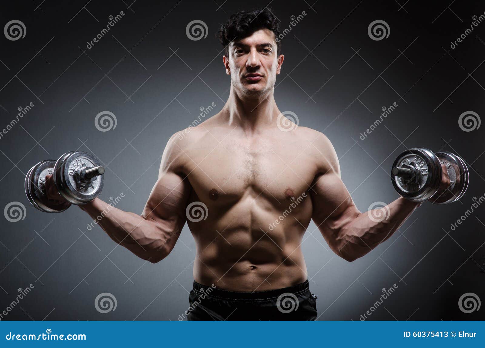 Muscular Ripped Bodybuilder with Dumbbells Stock Image - Image of ...