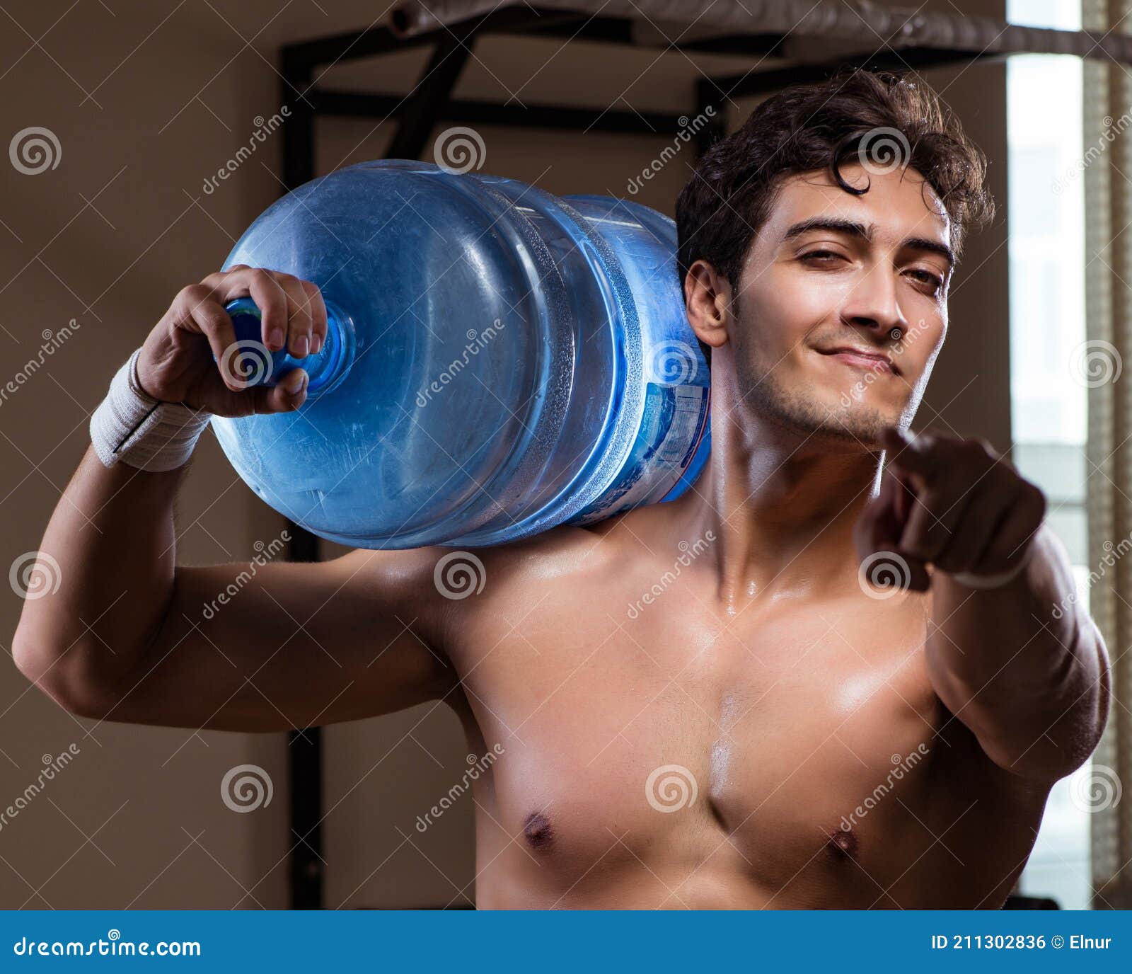 Muscular Ripped Man with Big Water Bottle Stock Photo - Image of muscle ...
