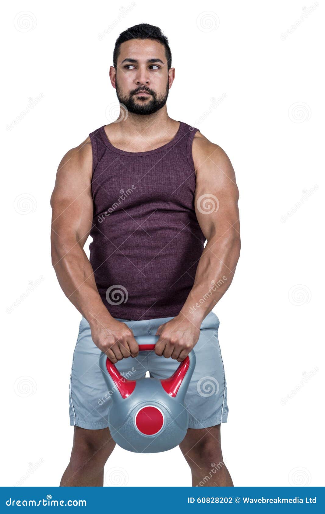 Muscular Serious Man Holding a Kettlebell Stock Photo - Image of ...