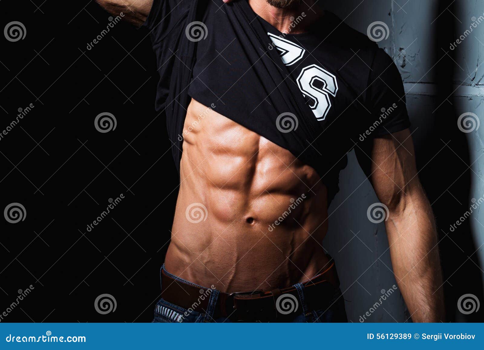 Muscular And Torso Of Young Man Having Perfect Abs, Bicep And Chest ...