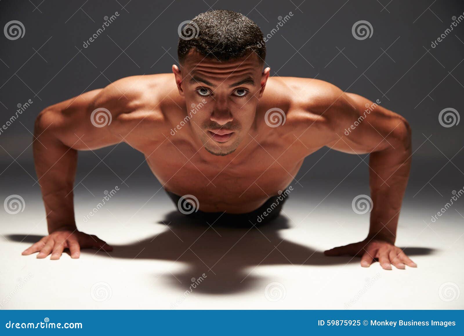 Muscular, Shirtless Young Man Doing Press-ups Stock Image - Image of ...