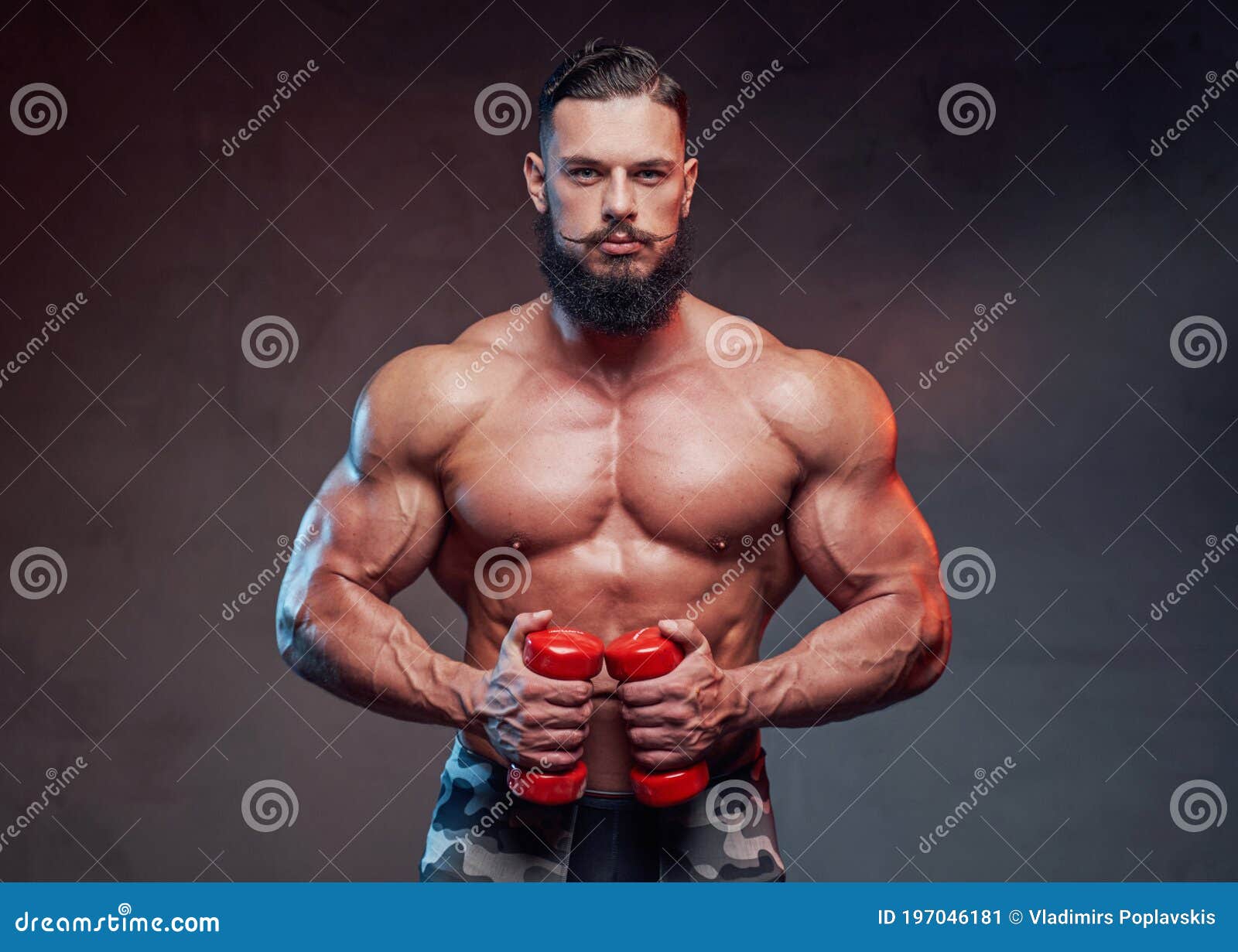 Muscular Soldier Posing with Dumbells in Studio Background Stock Image ...