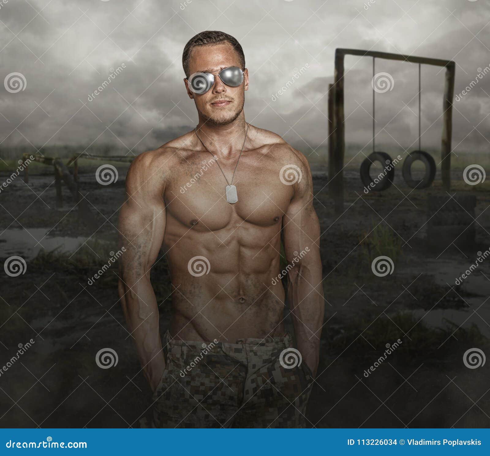 Muscular Soldier in a Training Swampland. Stock Photo - Image of gear ...