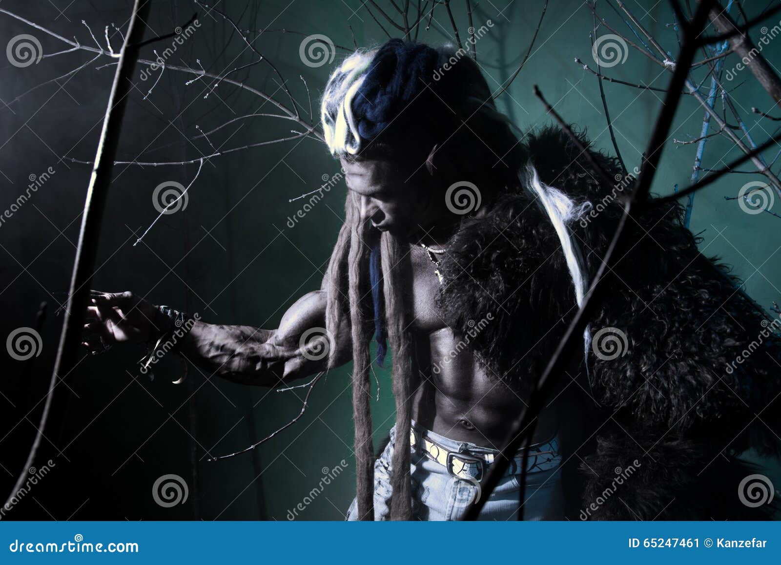 Muscular Werewolf With Dreadlocks With Long Nails Among The Bran ...