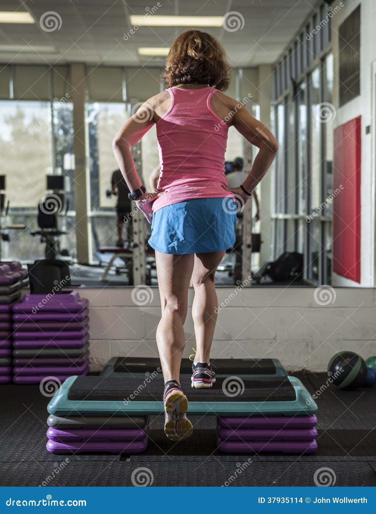 Muscular Woman Doing Step Aerobics Stock Photo - Image of pilates ...