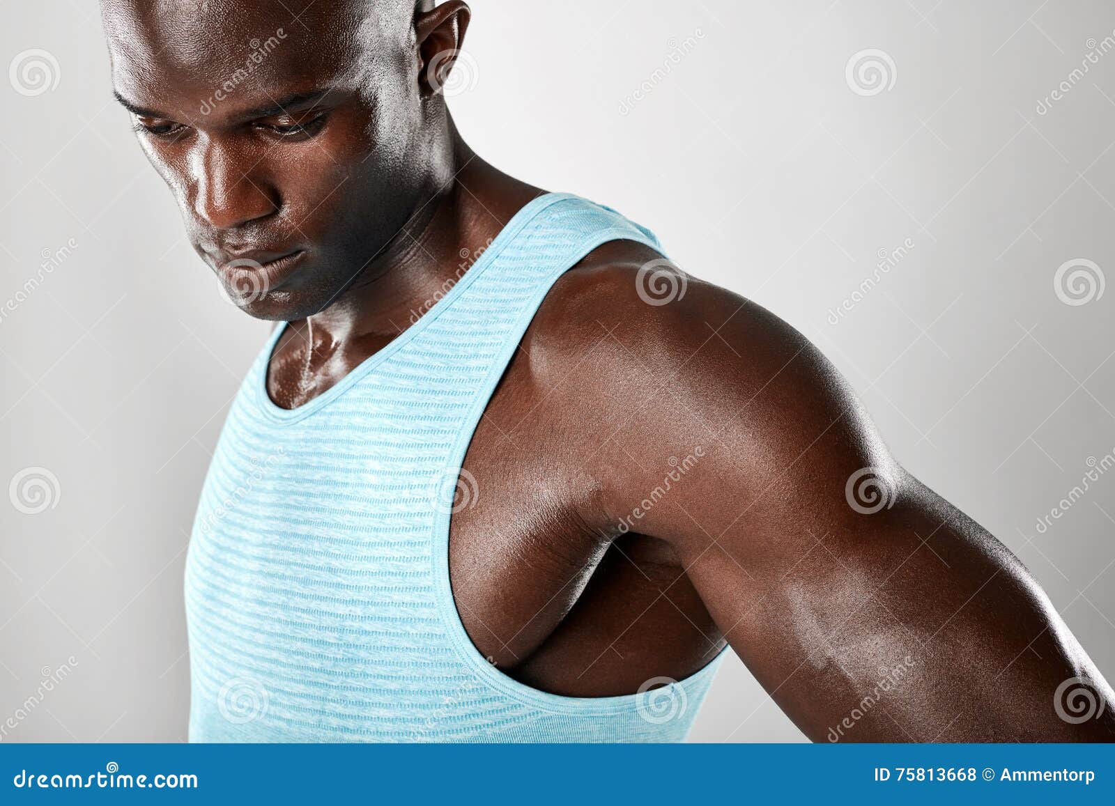 Muscular Young African Man Looking Down Stock Photo - Image of pensive ...