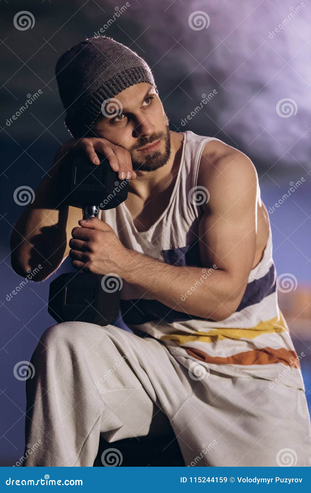 Muscular Bodybuilder with Dumbbells in Smoke Stock Image - Image of ...