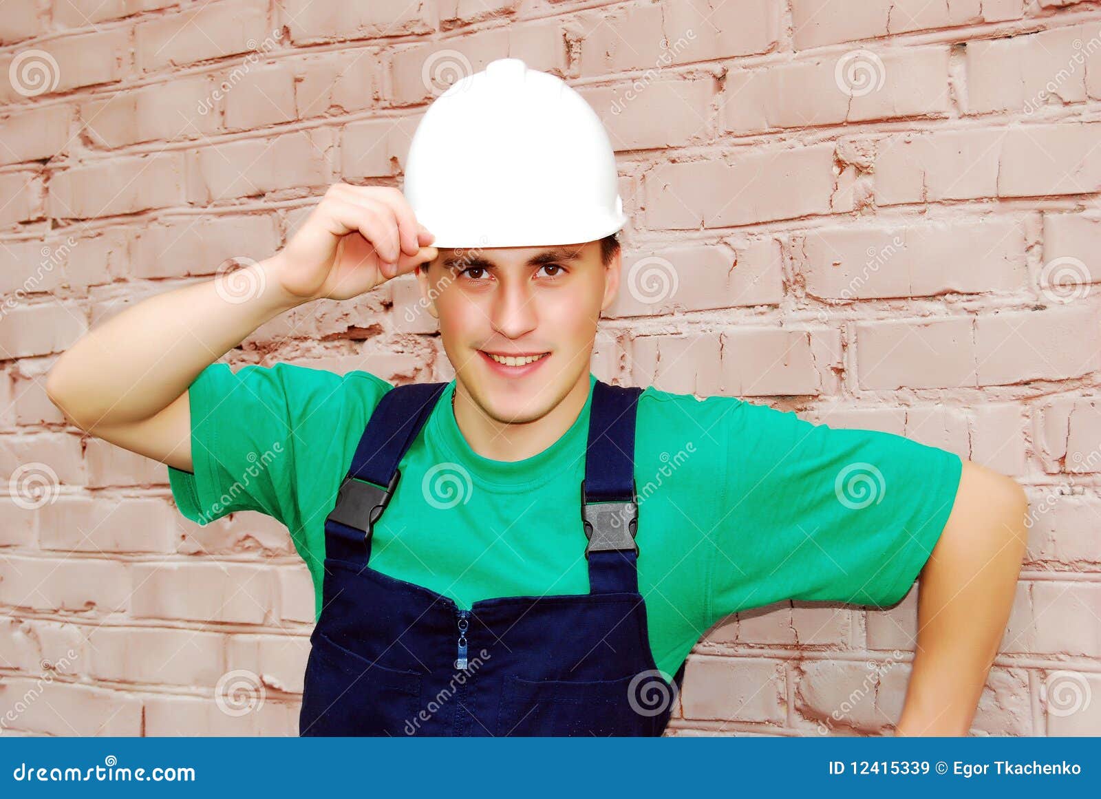 Muscular young builder. stock image. Image of house, decoration - 12415339