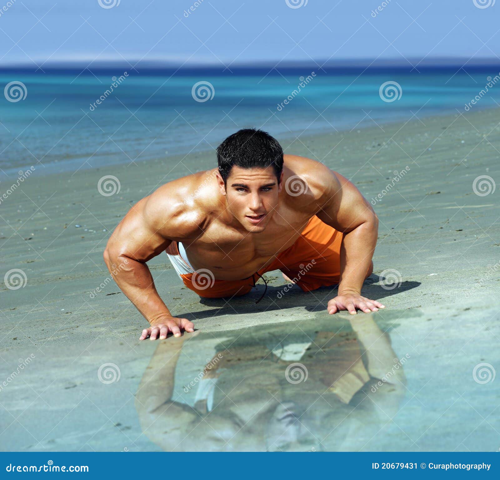 Muscular young man stock image. Image of male, buff, sand - 20679431