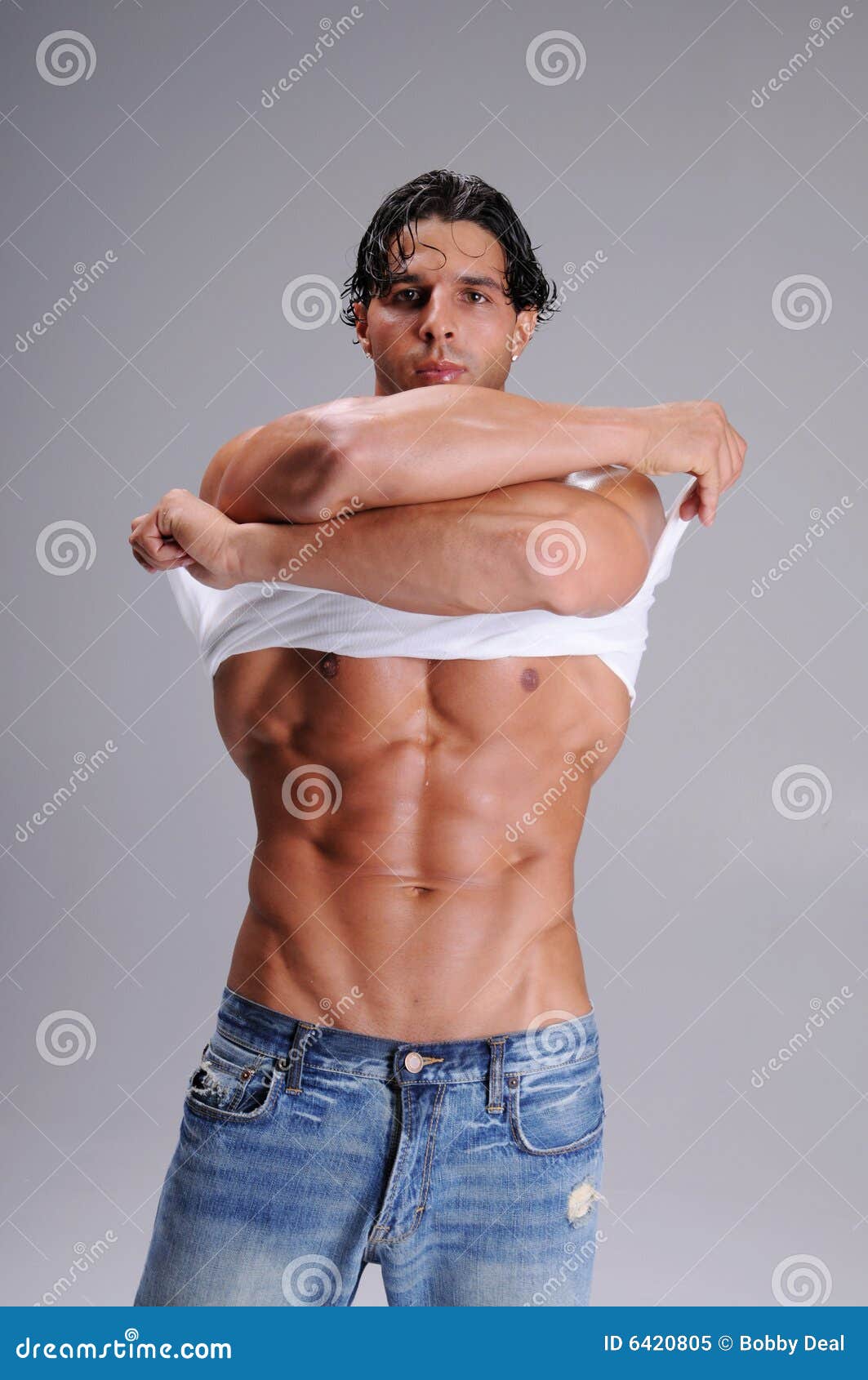 Muscular Young Man stock image. Image of disrobing, taking - 6420805