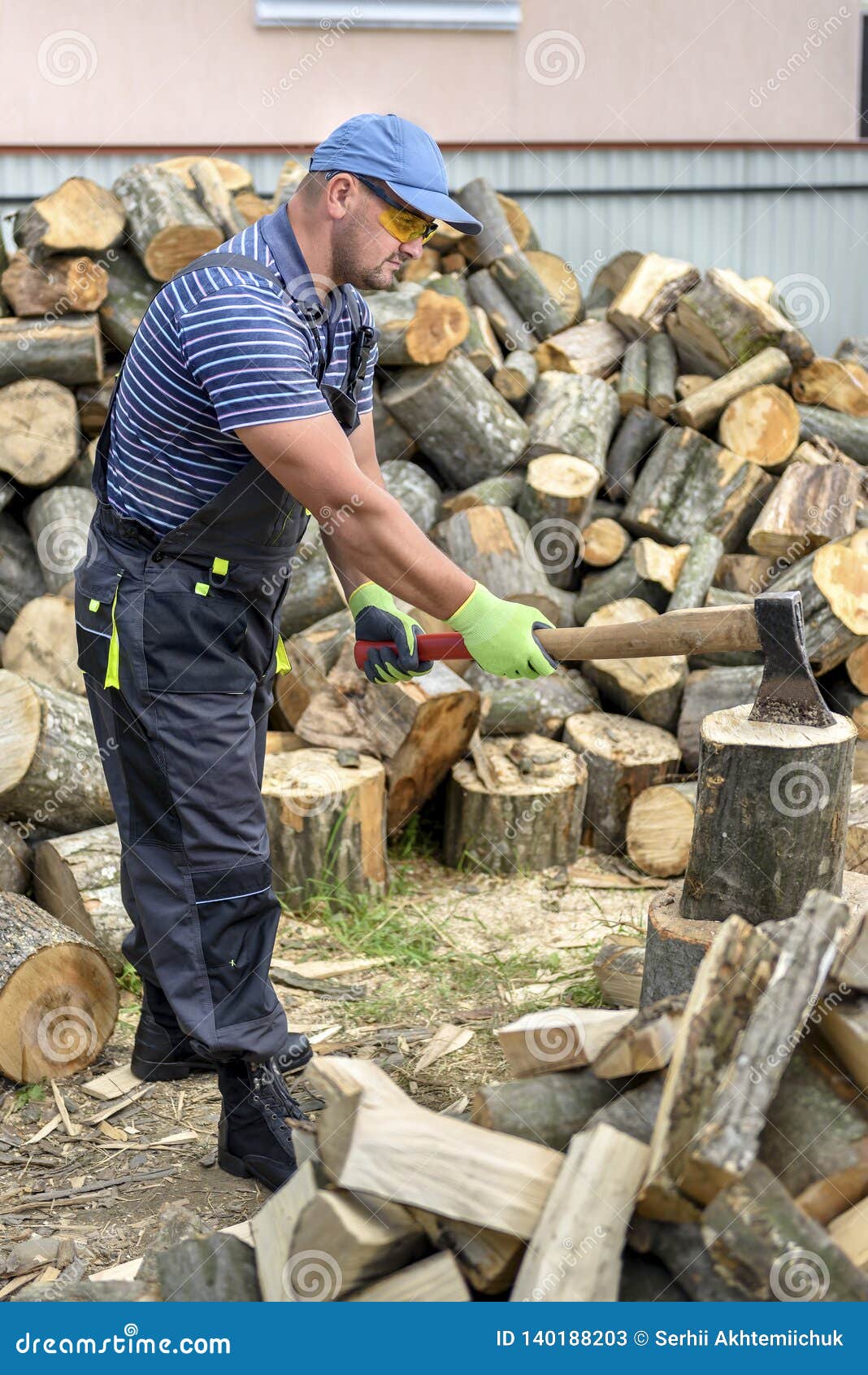 Muscular Young Man Chopping Logs Stock Image - Image of people, adult ...