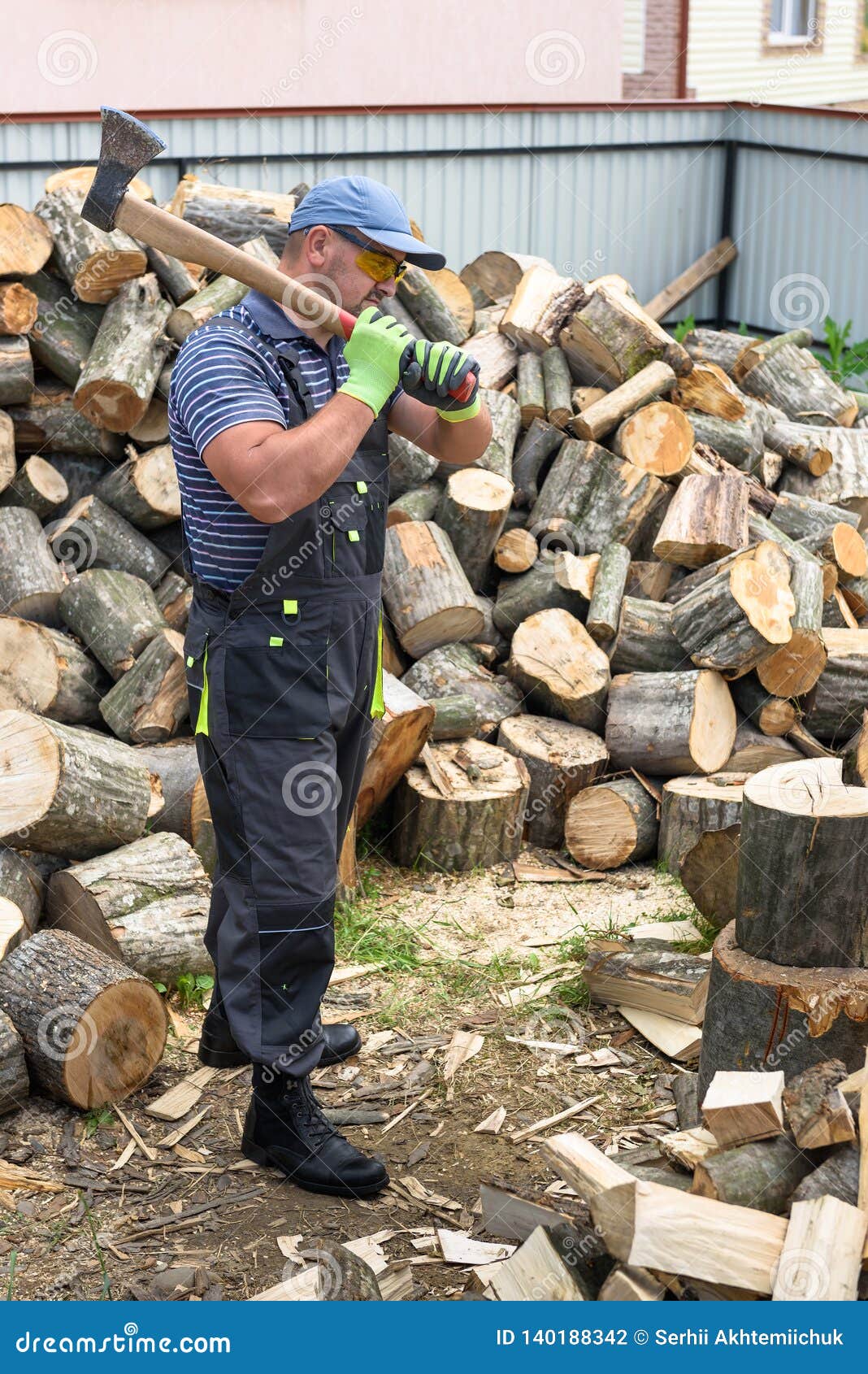 Muscular Young Man Chopping Logs Stock Photo - Image of professional ...