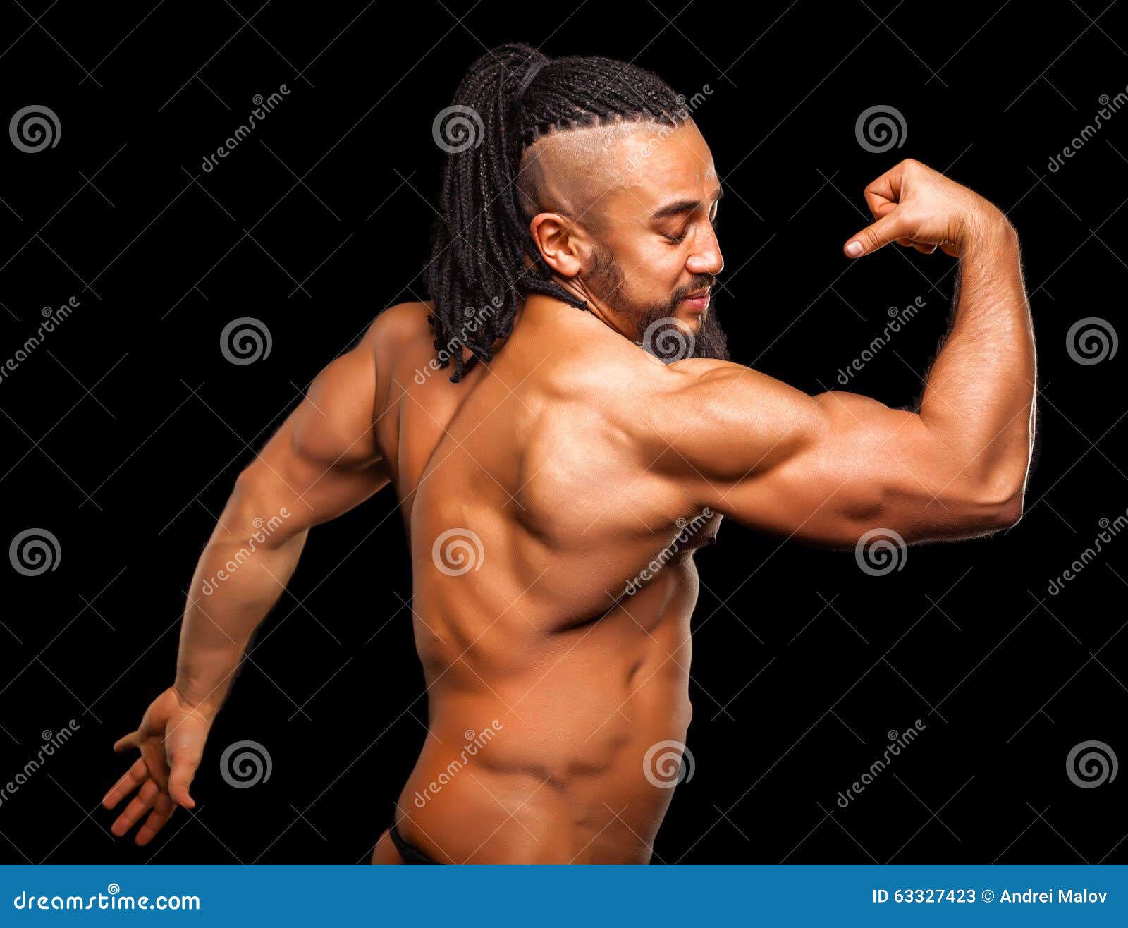 Muscular Young Man in Contrast Light Stock Image - Image of dark ...